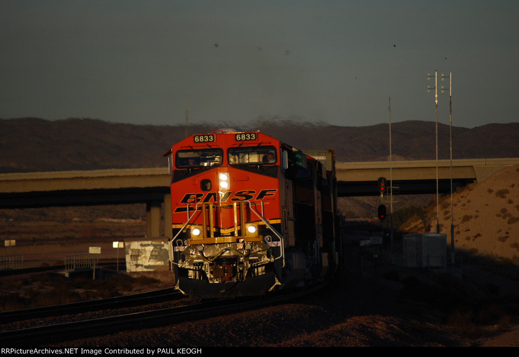 The Setting Sun Reflects her Rays off BNSF 6833's Very, Very Brand New BNSF/GE Swoosh New Logo ...